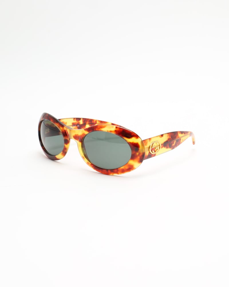 Vintage Gucci Orange Sunglasses with Gold-Tone Hardware - A Retro Tale