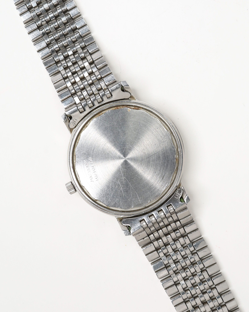 Vintage Universal Genève White Shadow 34mm Automatic Watch - A Retro Tale