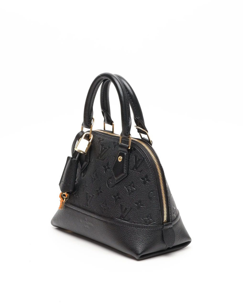 Vintage Louis Vuitton Empreinte Neo Alma BB Bag - A Retro Tale