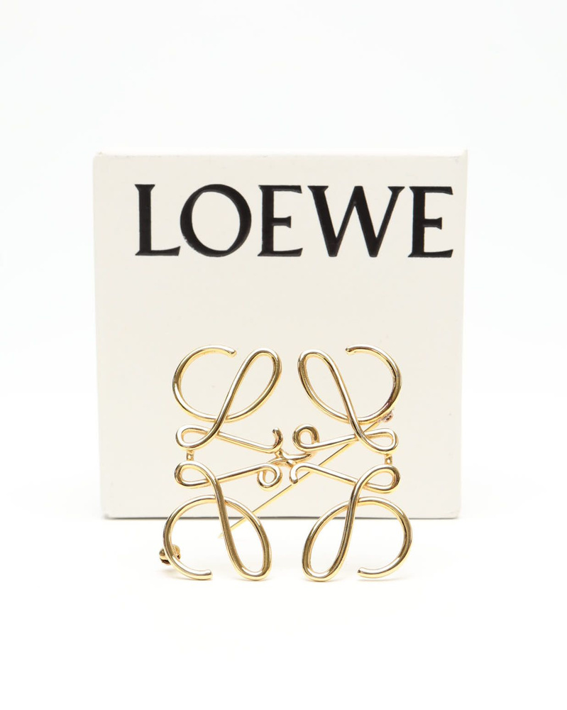 Vintage Loewe Anagram Brooch - A Retro Tale