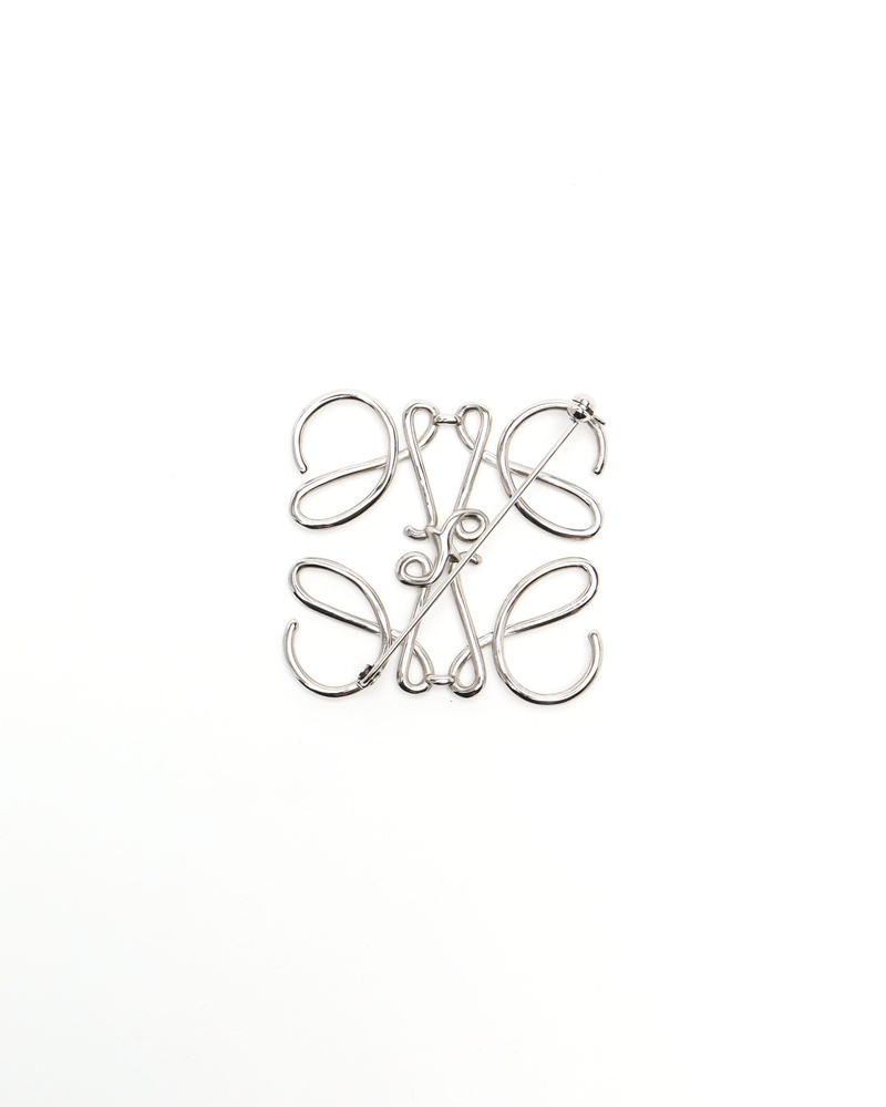 Vintage Loewe Anagram Brooch Silver - A Retro Tale