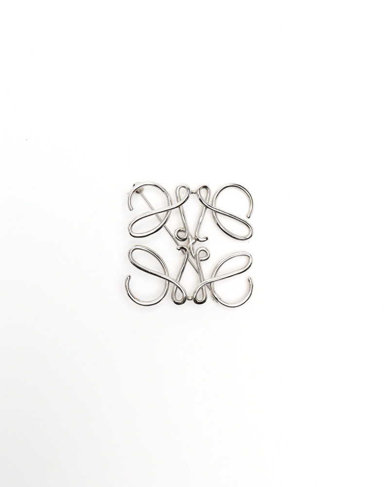 Vintage Loewe Anagram Brooch Silver - A Retro Tale