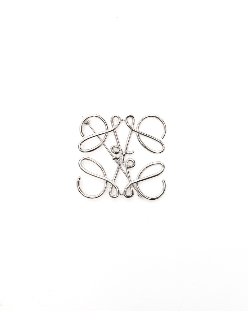 Vintage Loewe Anagram Brooch Silver - A Retro Tale