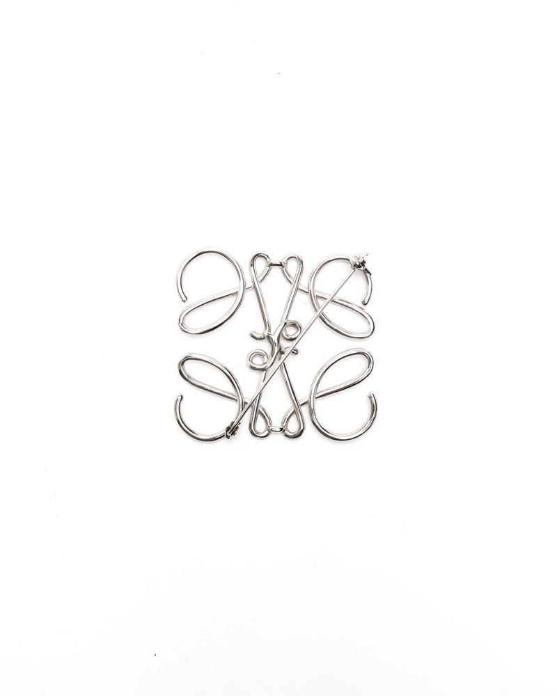 Vintage Loewe Anagram Brooch Silver - A Retro Tale